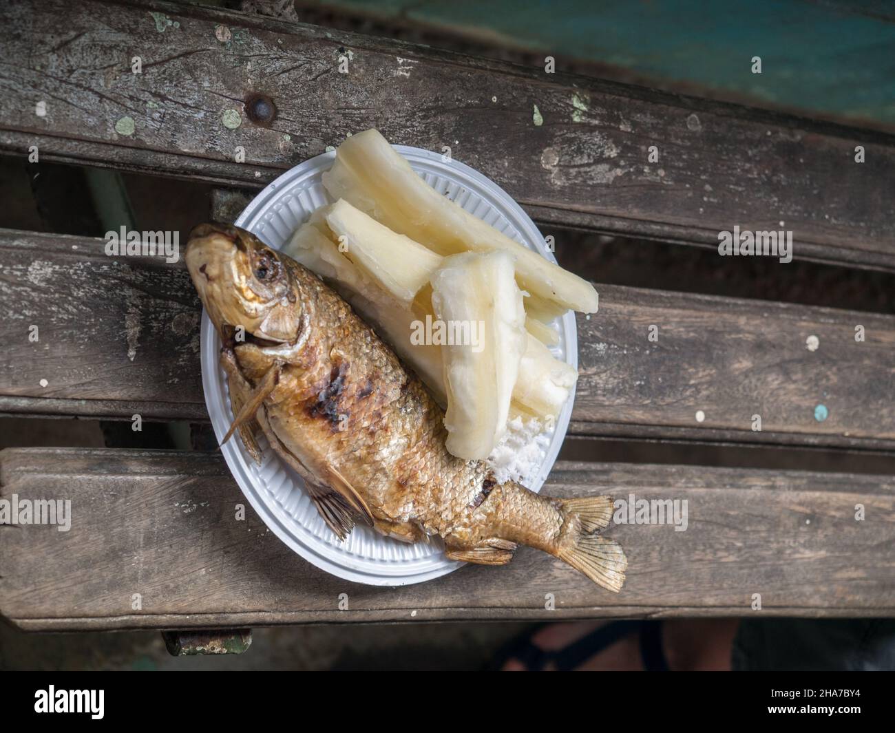 Baked fish and cassava imported by a seller freshly caught in the ...