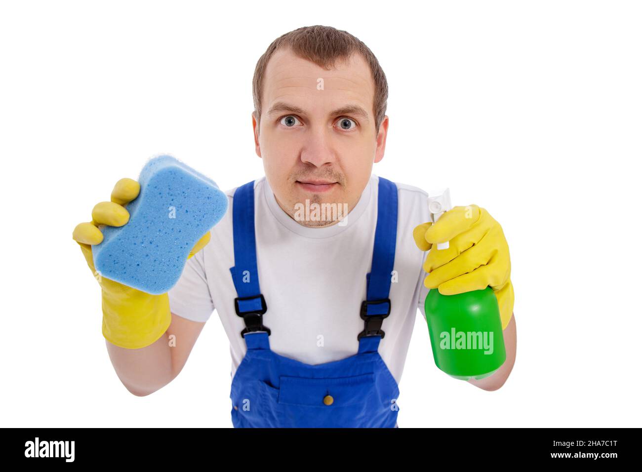 cleaning service concept - funny male cleaner in blue uniform cleaning ...