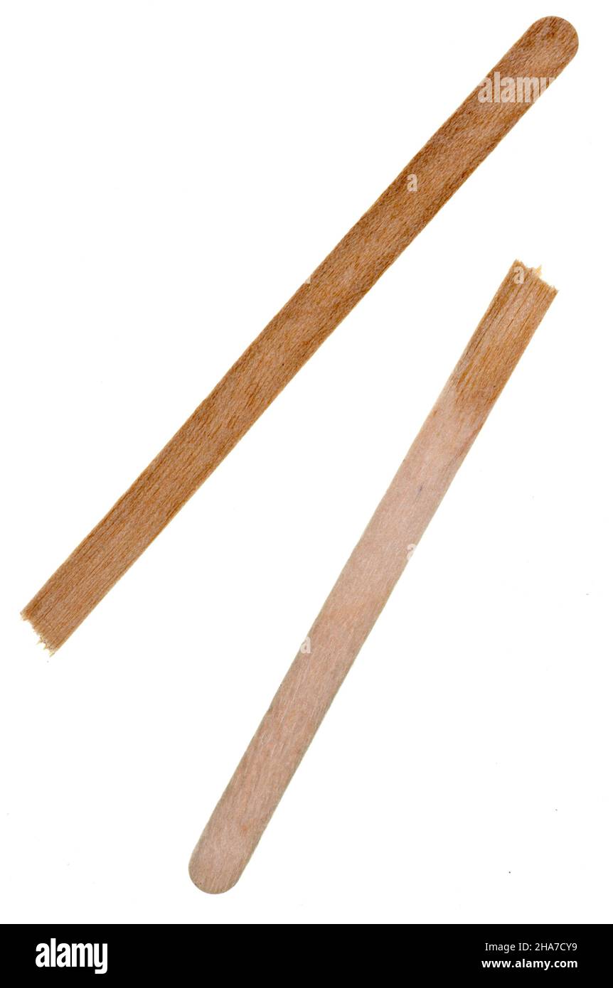 Broken sticks isolated on white background Stock Photo - Alamy