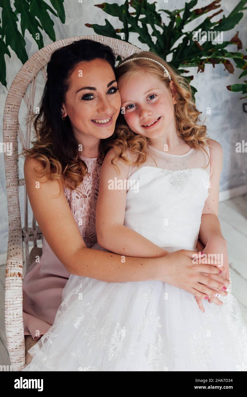 portrait of mother and daughter in dresses Stock Photo - Alamy