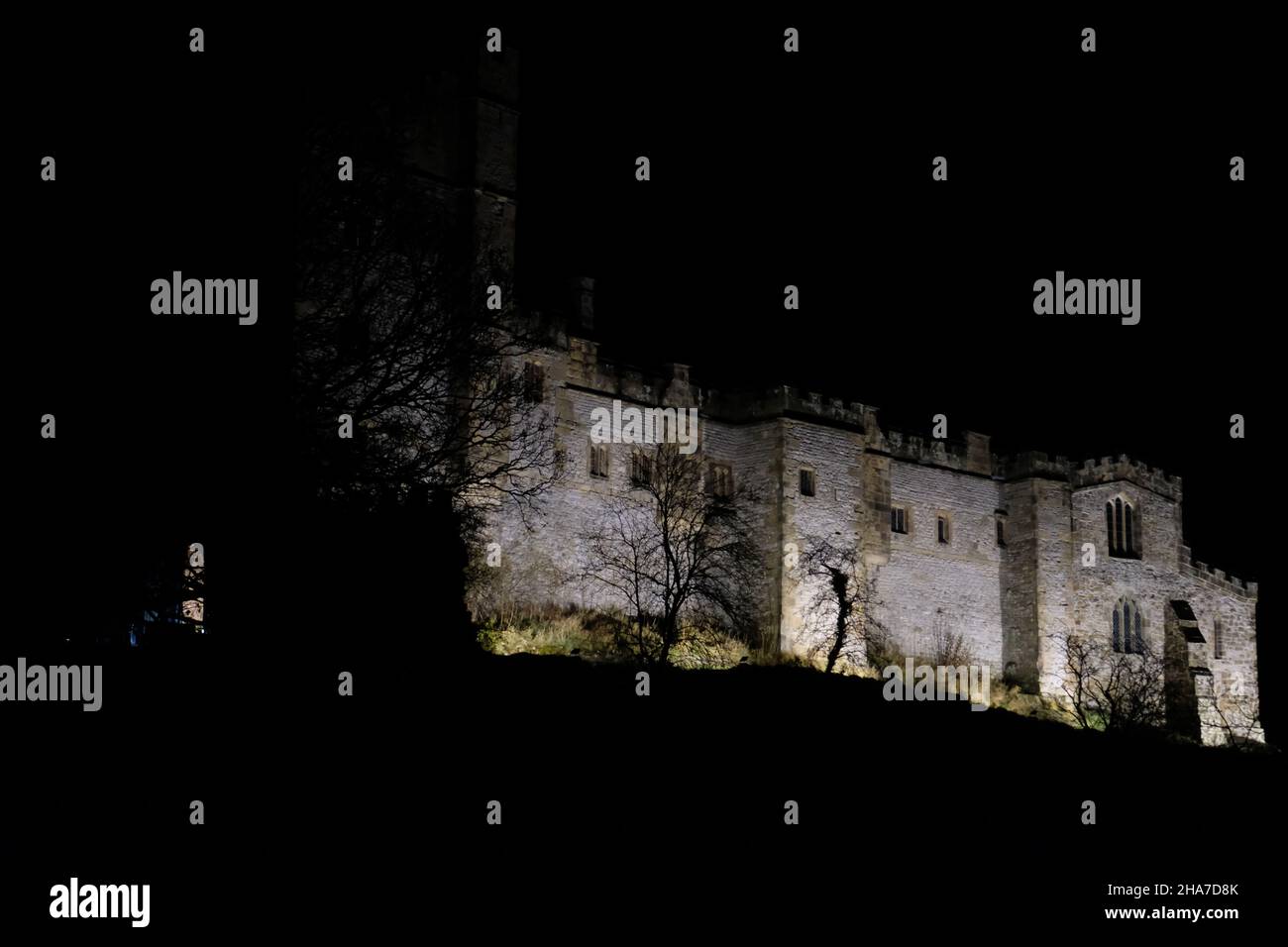 Haddon Hall near Bakewell, Derbyshire medieval manor house floodlit at ...