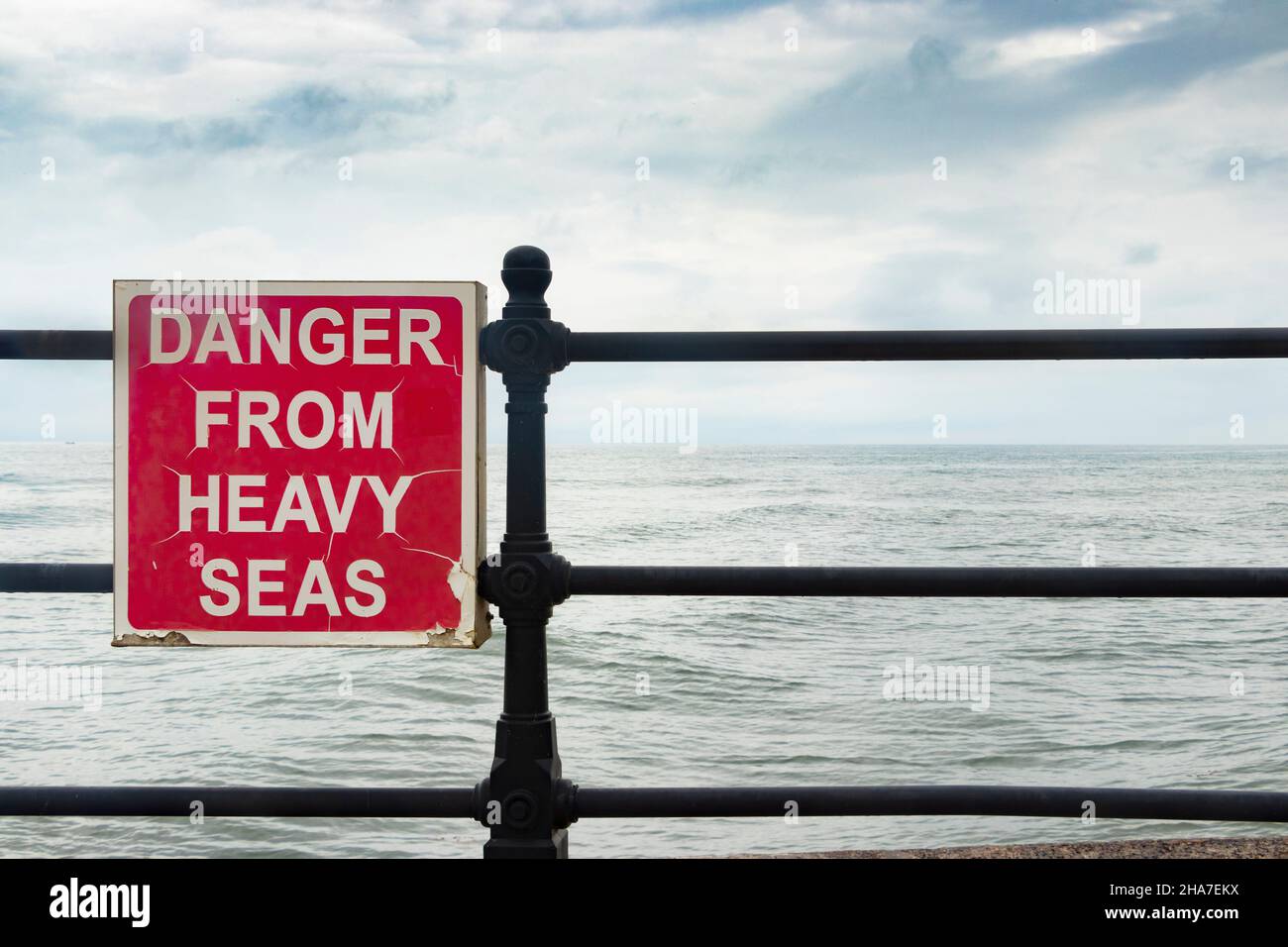 danger from heavy seas warning sign Stock Photo - Alamy