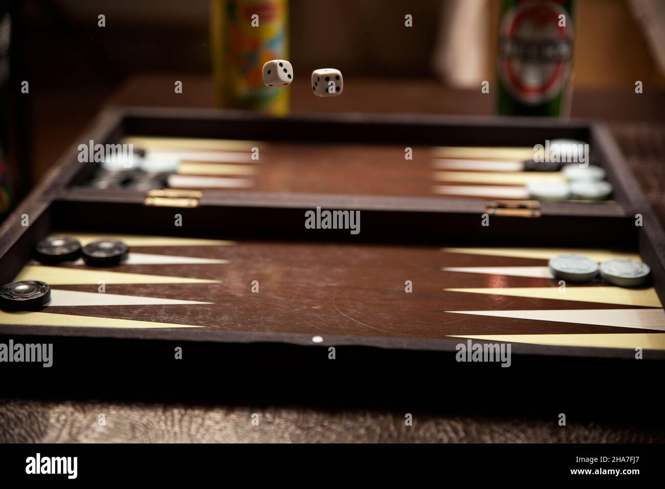 Zoom and focus on the dices while a backgammon competition at the high ...