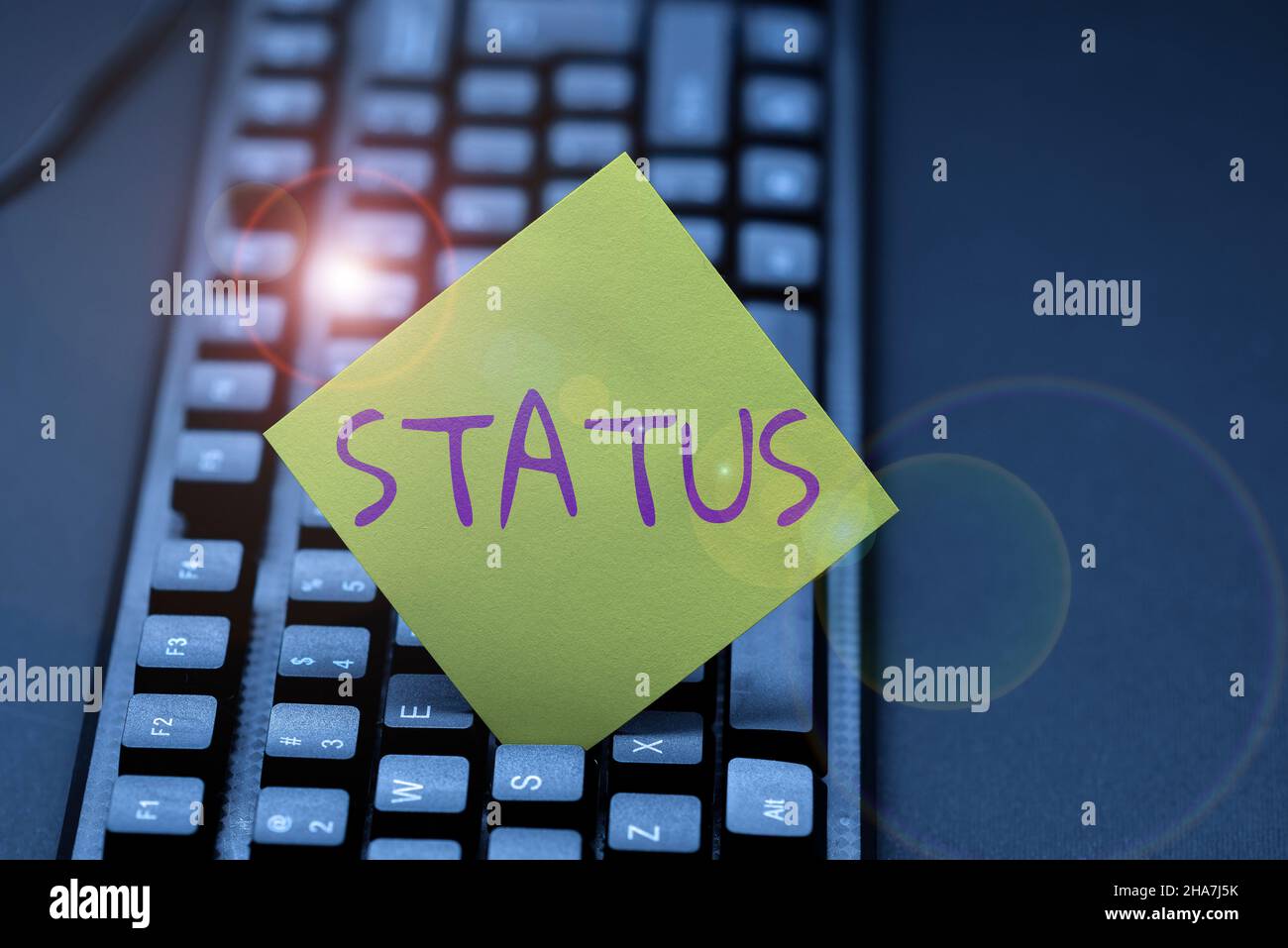 Hand writing sign Status. Word Written on situation at a particular ...