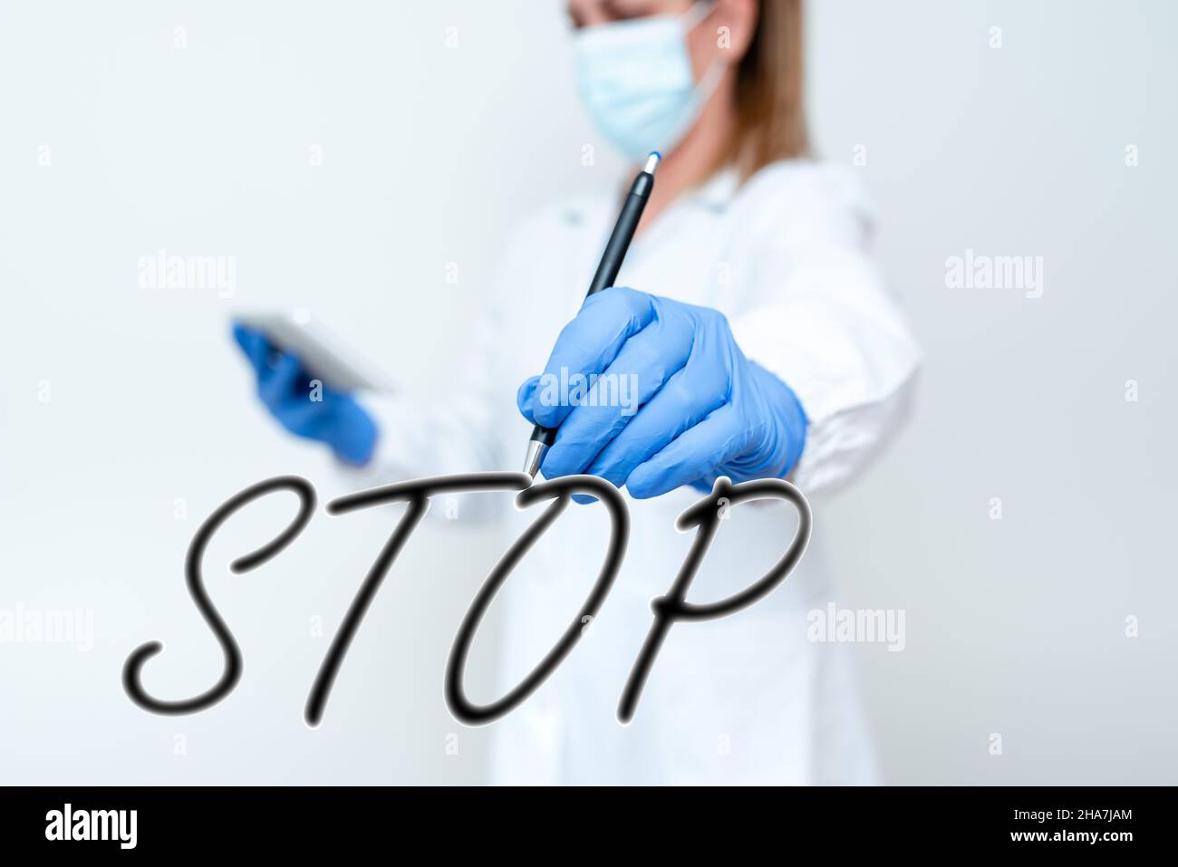 Sign displaying Stop. Concept meaning Come to an end Prevent Take ...