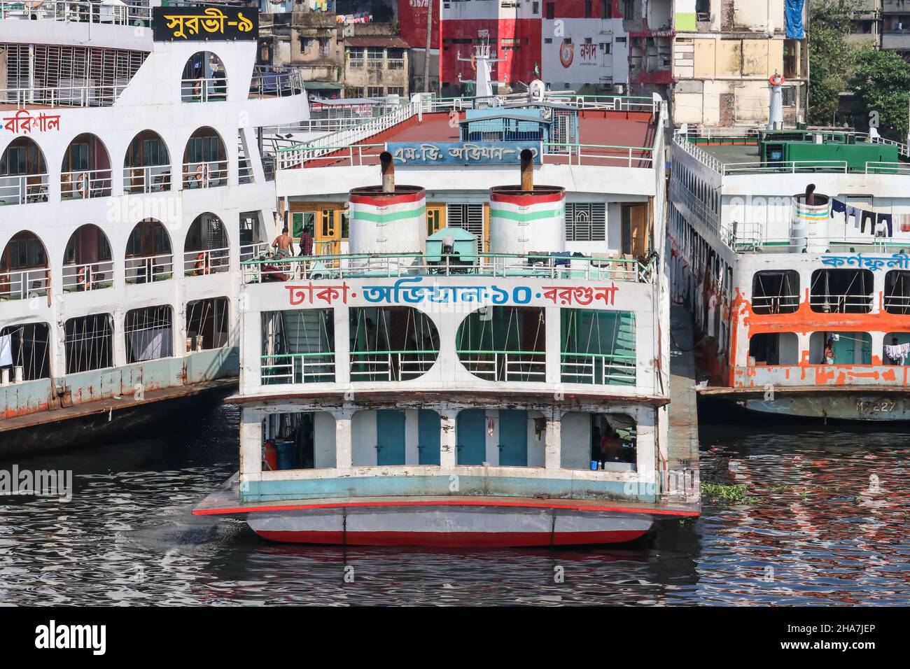 Dhaka, Bangladesh : The Buriganga river is always busy with wooden boats and passenger ferries ...