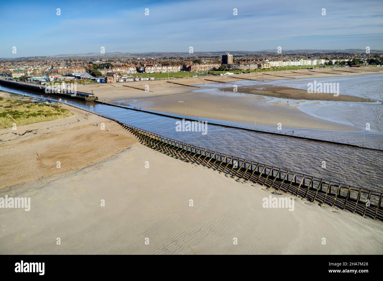 Aerial photo over Littlehampton beach at low tide and the River Arun ...