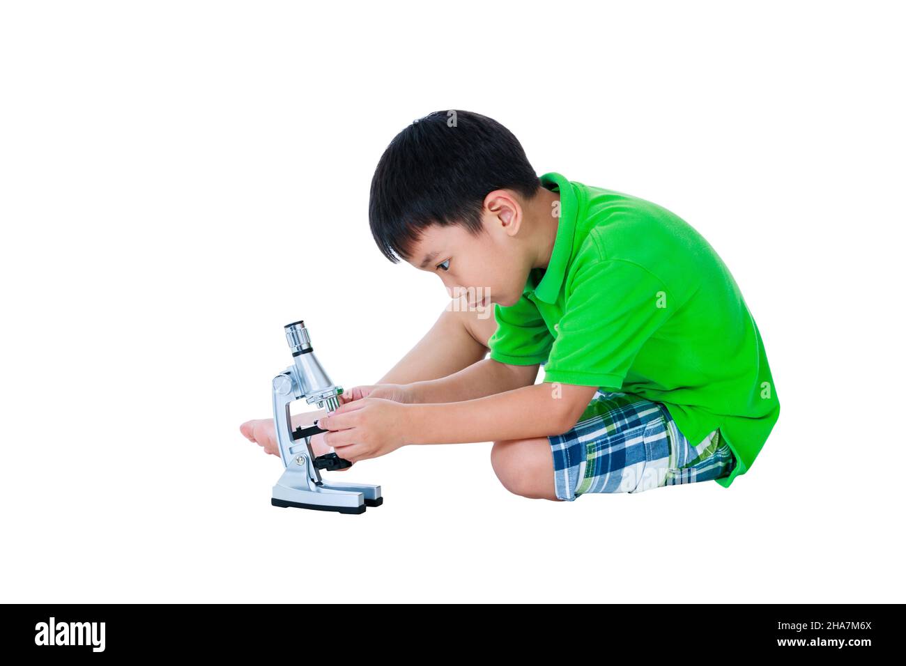 Full body of asian child with a microscope biological preparations. Boy ...