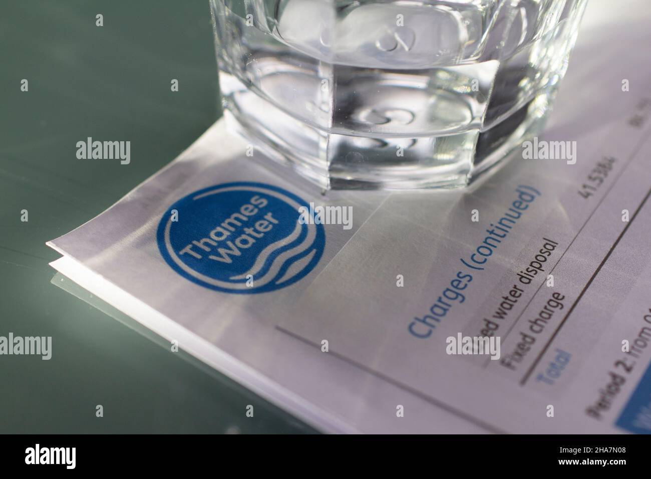 Thames Water bill with glass of water Stock Photo - Alamy