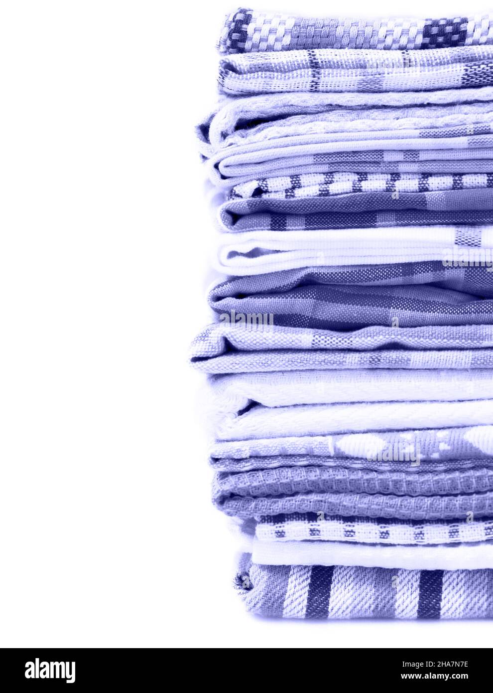 Pile of linen kitchen towels isolated on white background. Color of ...