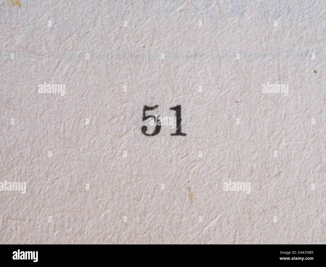 The number 51 printed on a piece of paper. Paper texture Stock Photo ...