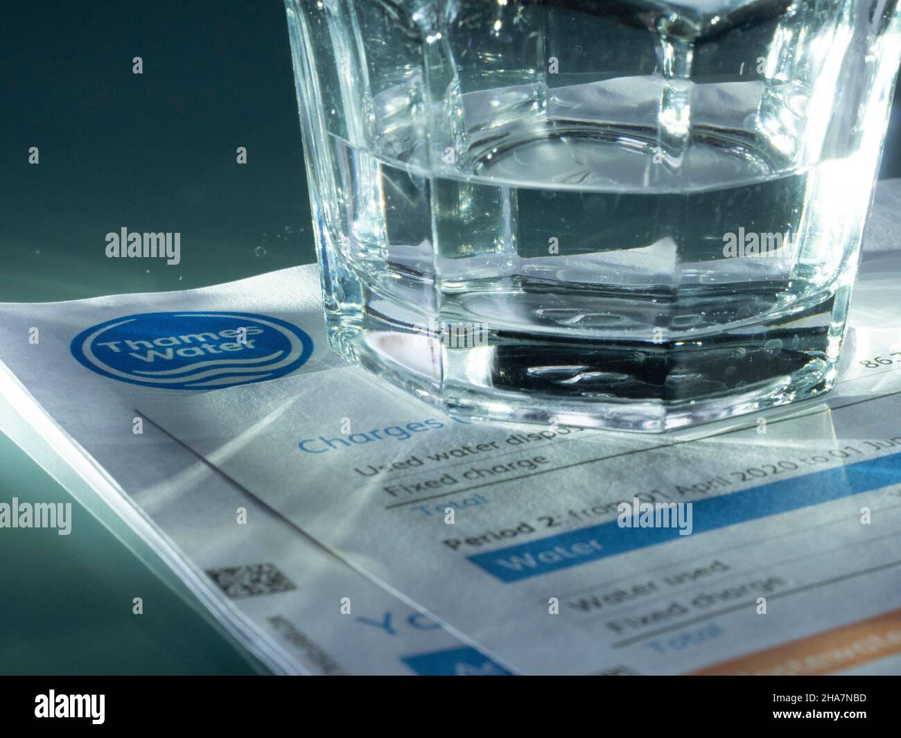 Thames Water bill with glass of water Stock Photo - Alamy