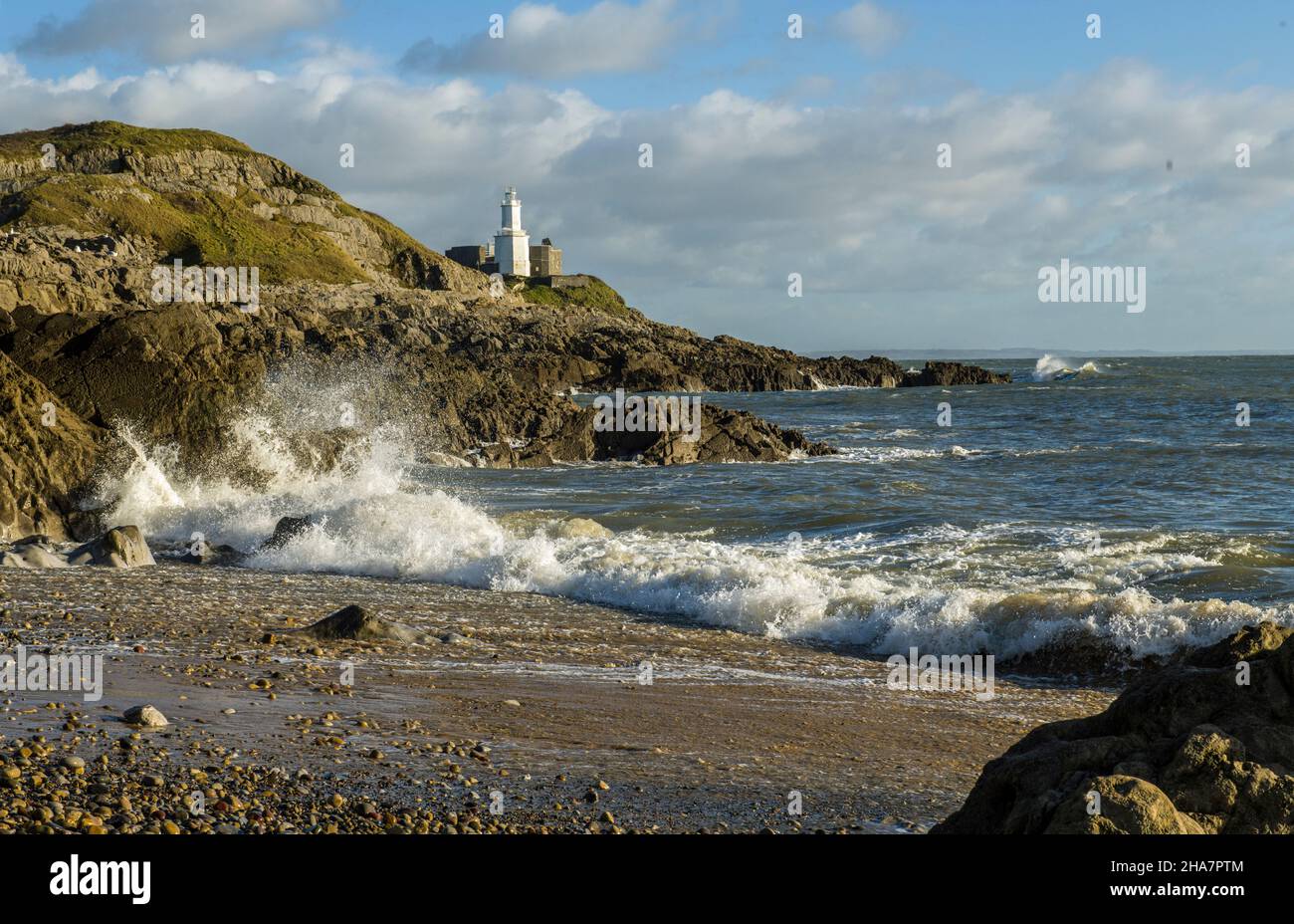 Mumbles Lighthouse on the South Wales coast near Bracelet Bay on the ...