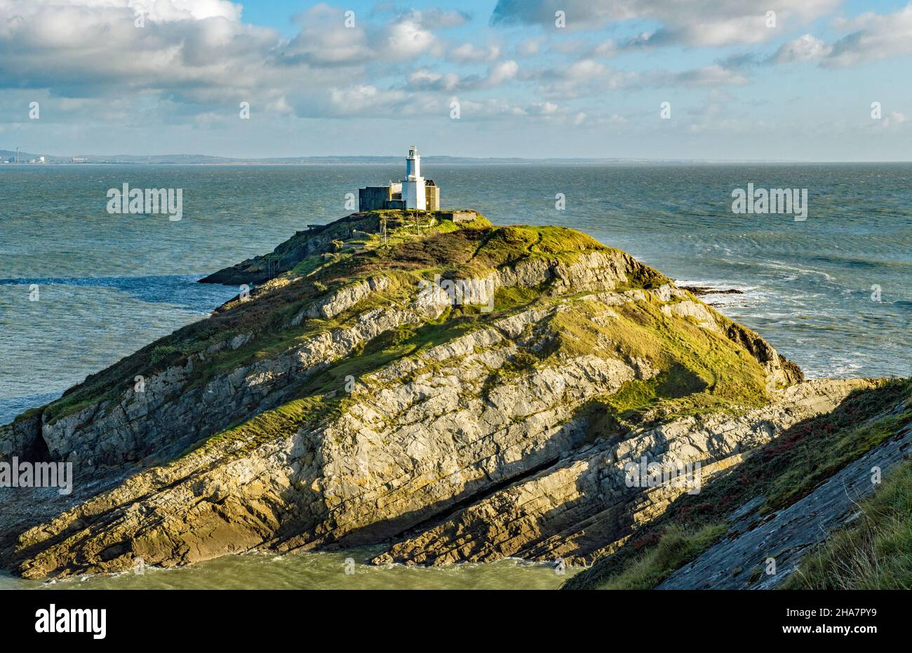 The Mumbles Lighthouse on the third rock out into Swansea Bay on the ...