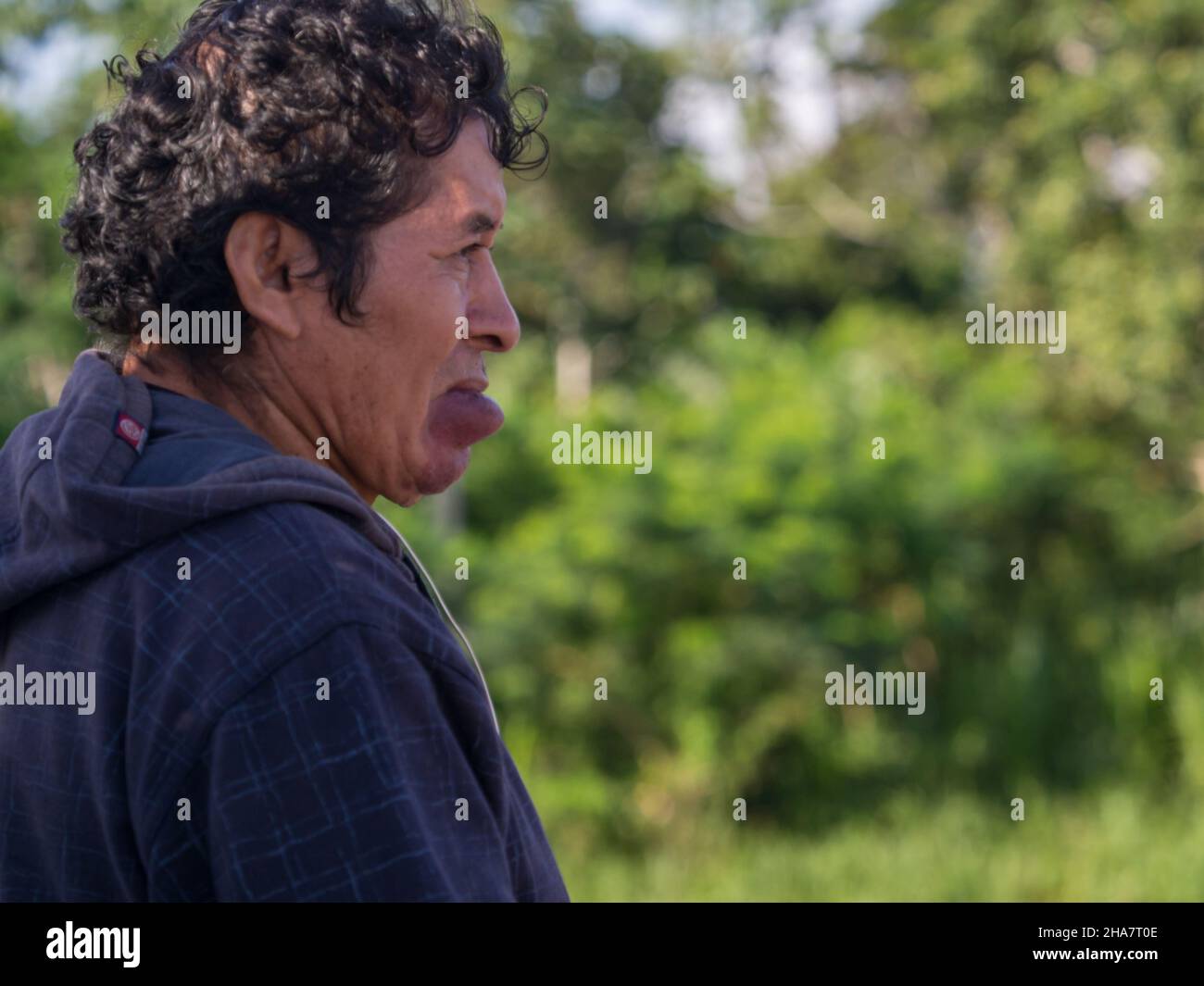 Jungle, Brazil - Dec, 2017: Portrait of a man with a red skin in the ...