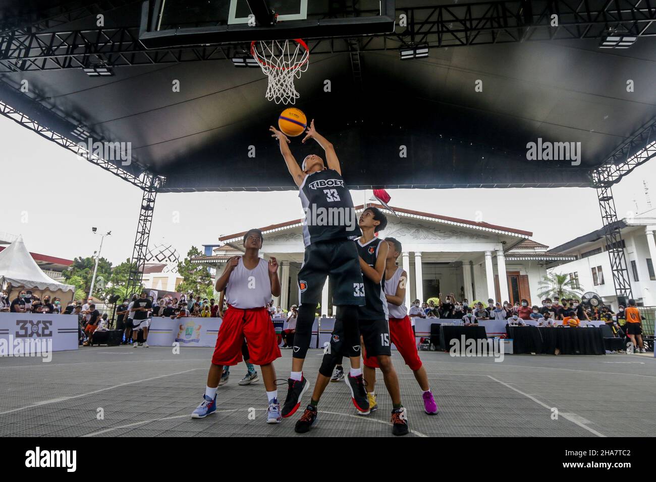Men play 3x3 basketball during a competition 3x3 basketball at city ...