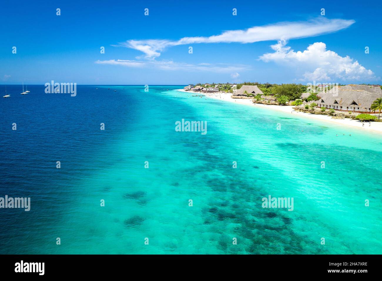 Aerial view of Nungwi beach in Zanzibar, Tanzania with luxury resort ...