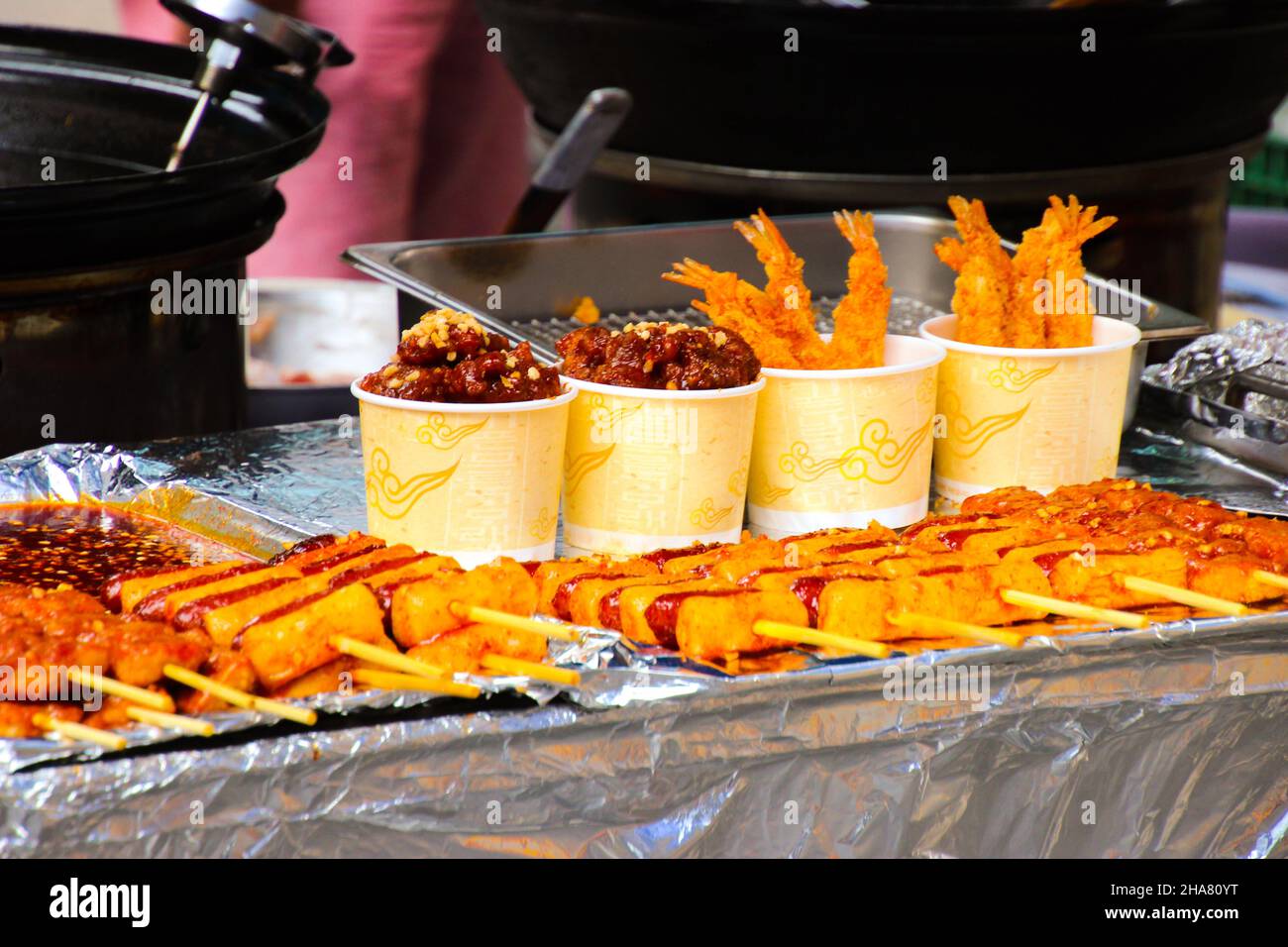 Streetfood fried shrimp chicken tteokbokki skewers and cups Stock Photo ...