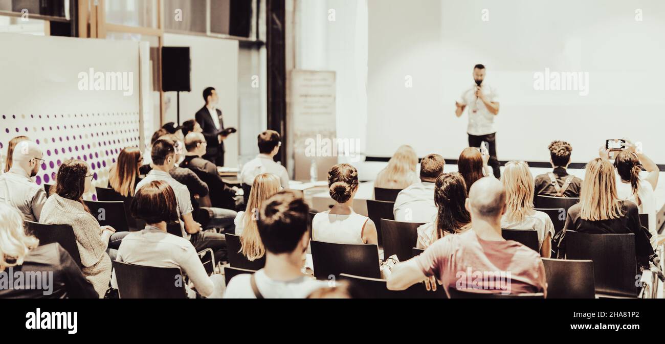 Business speaker giving a talk at business conference event Stock Photo ...