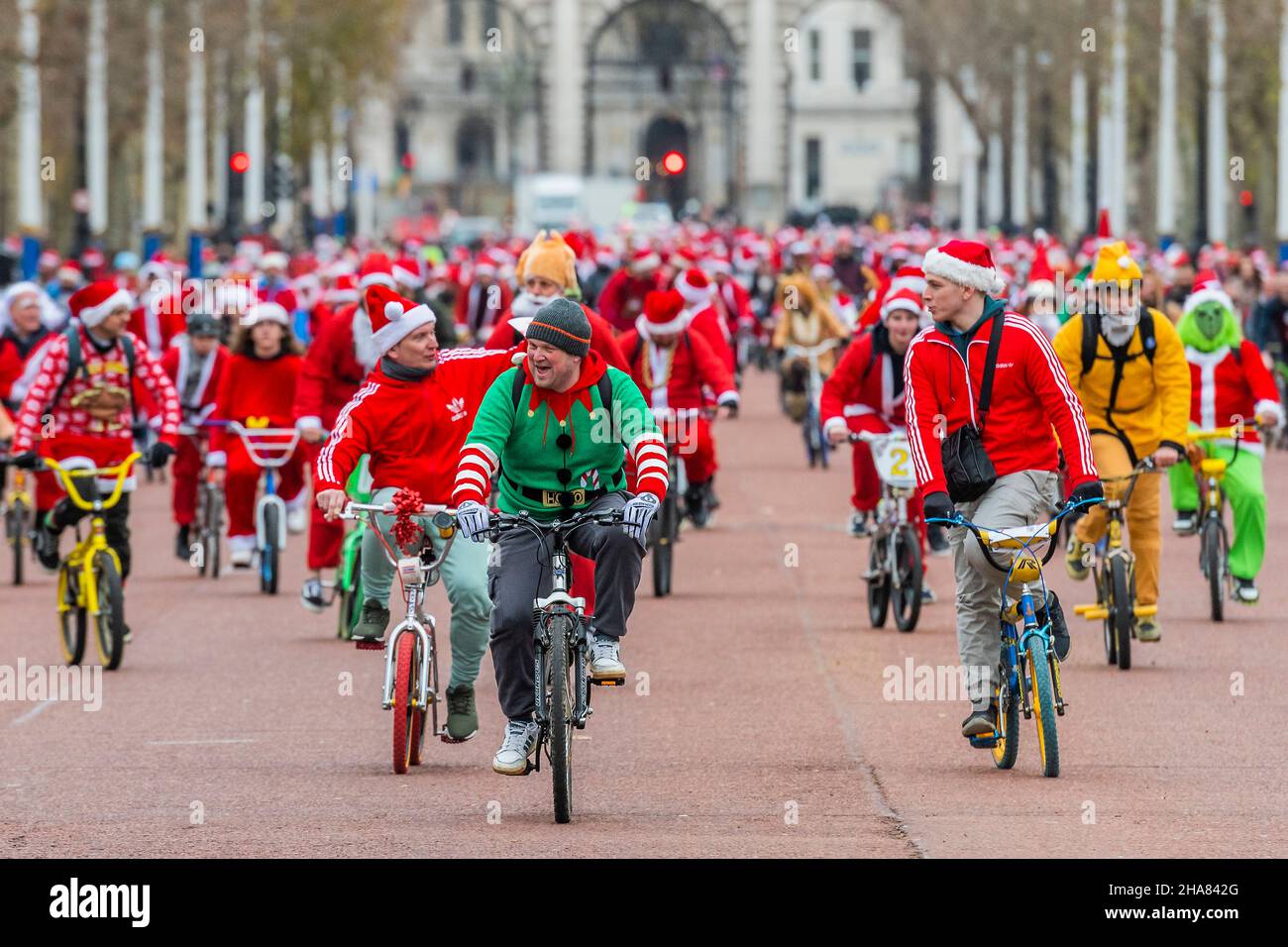 London, UK. 11th Dec, 2021. Riding down the Mall in Sant suits - The ...