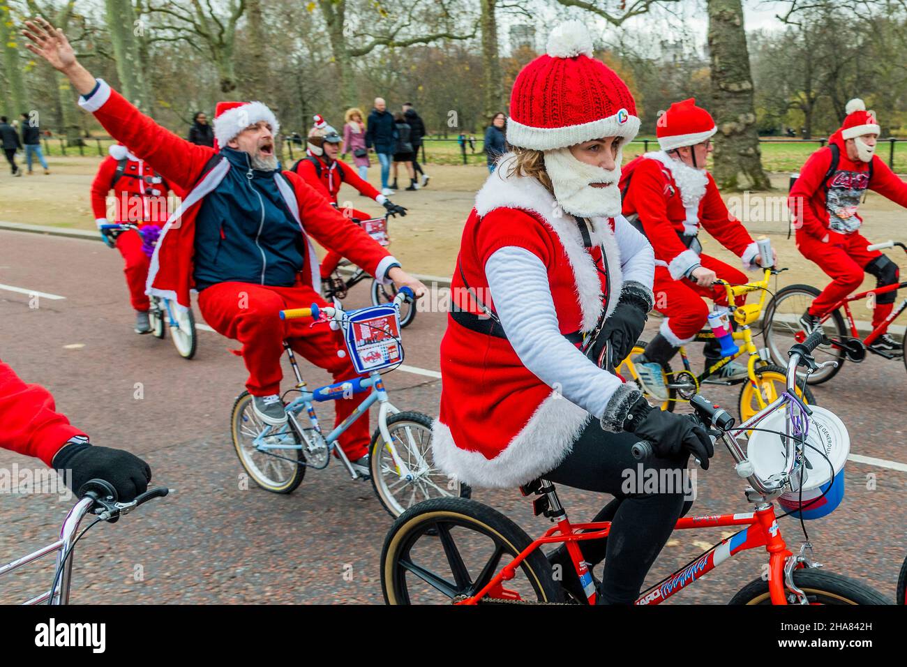 London, UK. 11th Dec, 2021. Riding down the Mall in Sant suits - The ...