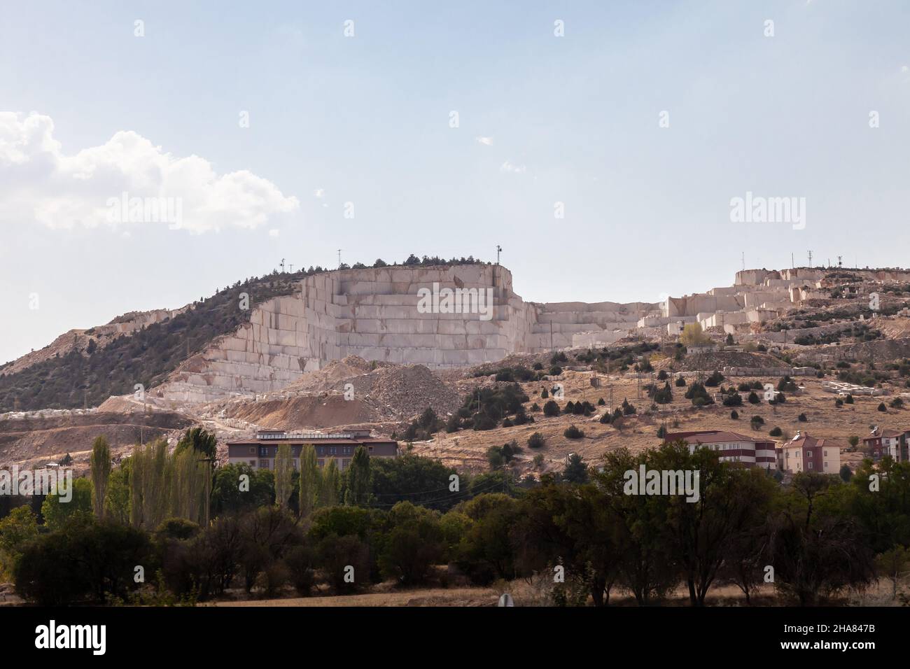 High stone mountain and marble quarries in Turkey. Open marble mining ...