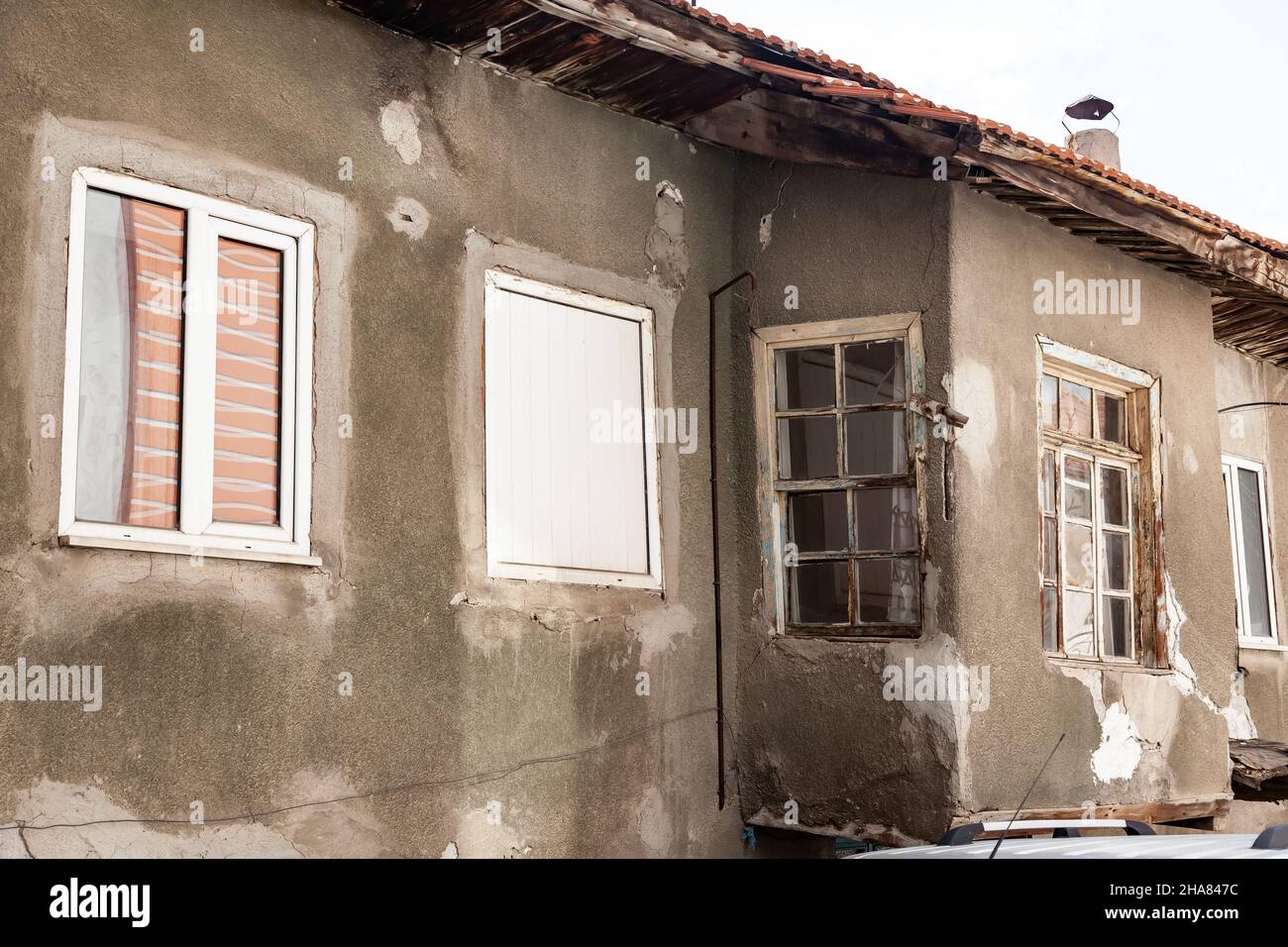 Old crumbling buildings and crumbling hillsides in the slums of Ankara ...