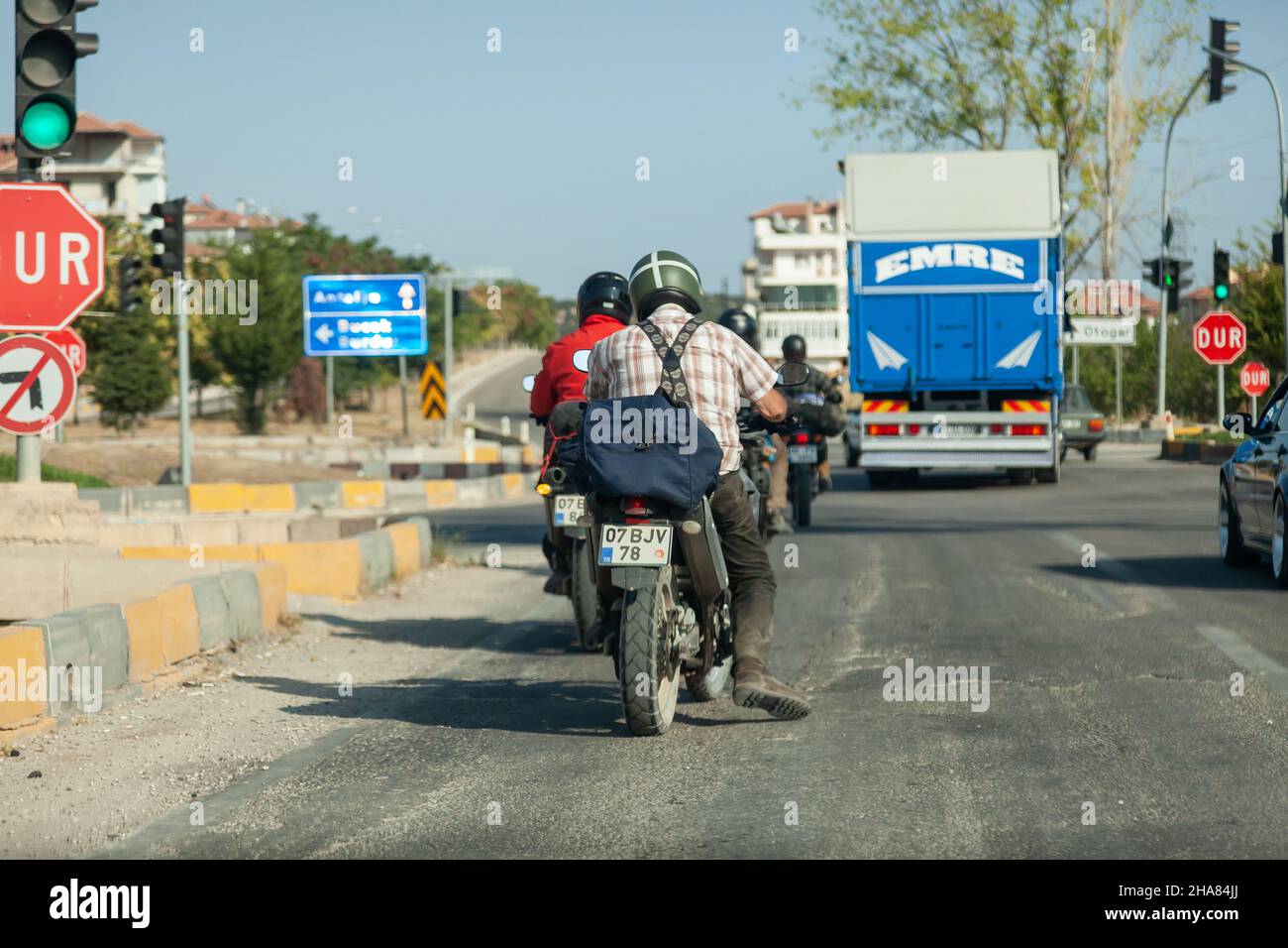 Antalya, Turkey - 08. 28. 2021: A group of four men travel on ...