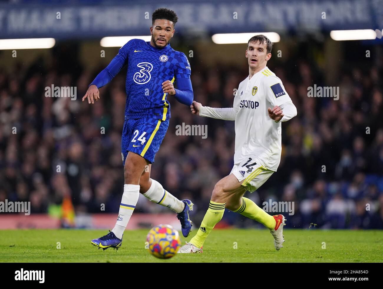 Chelsea's Reece James (left) and Leeds United's Diego Llorente battle ...