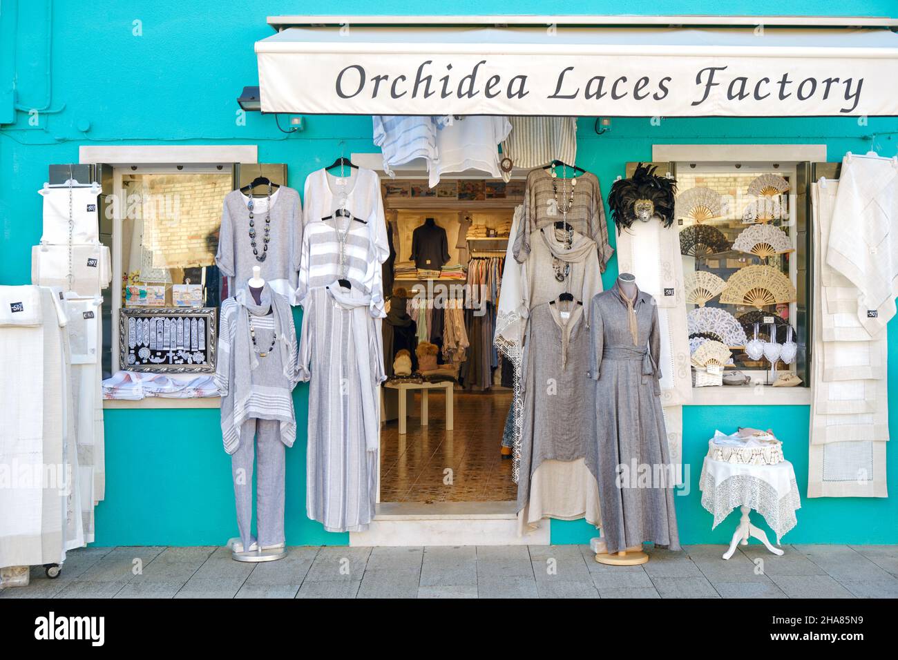 Traditional handmade lace store entrance in venetian island of Burano ...