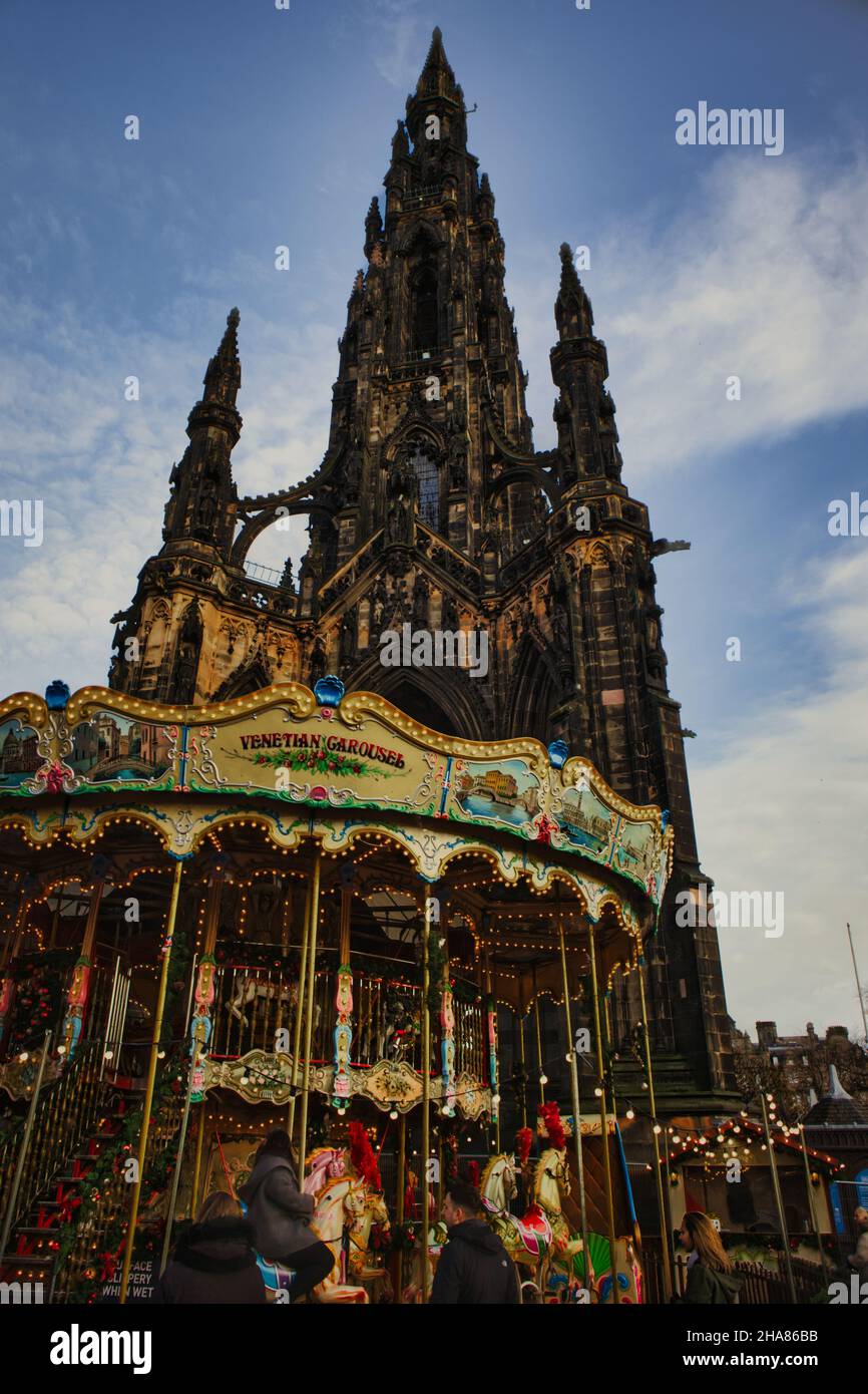 Scott monument with Carousel in Edinburgh Scotland Stock Photo - Alamy