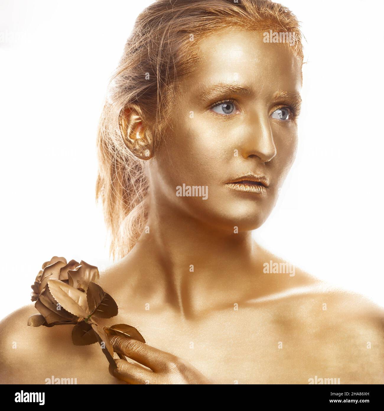 Gold painted skin hi-res stock photography and images - Alamy