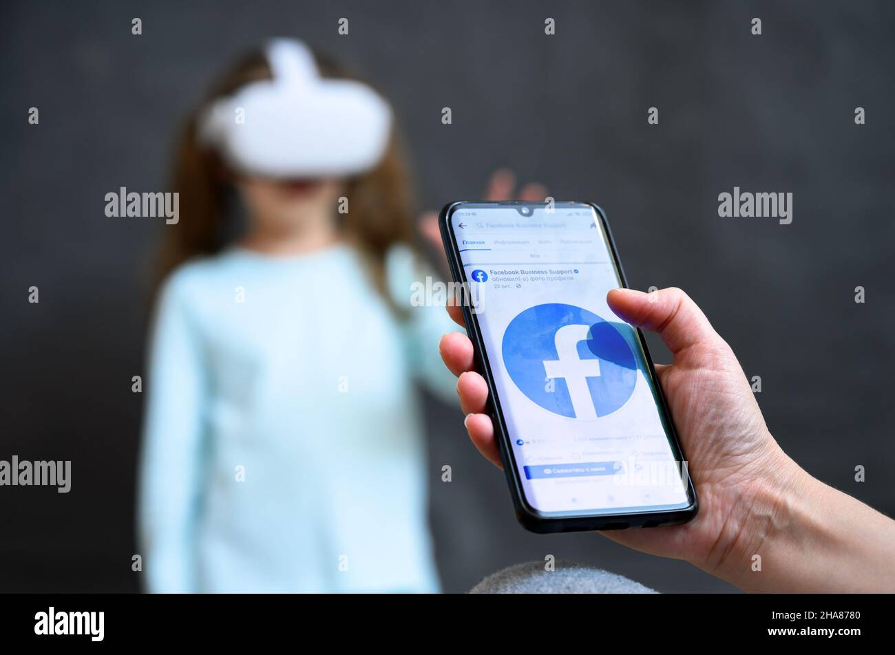 Facebook logo on mobile phone hi-res stock photography and images - Alamy
