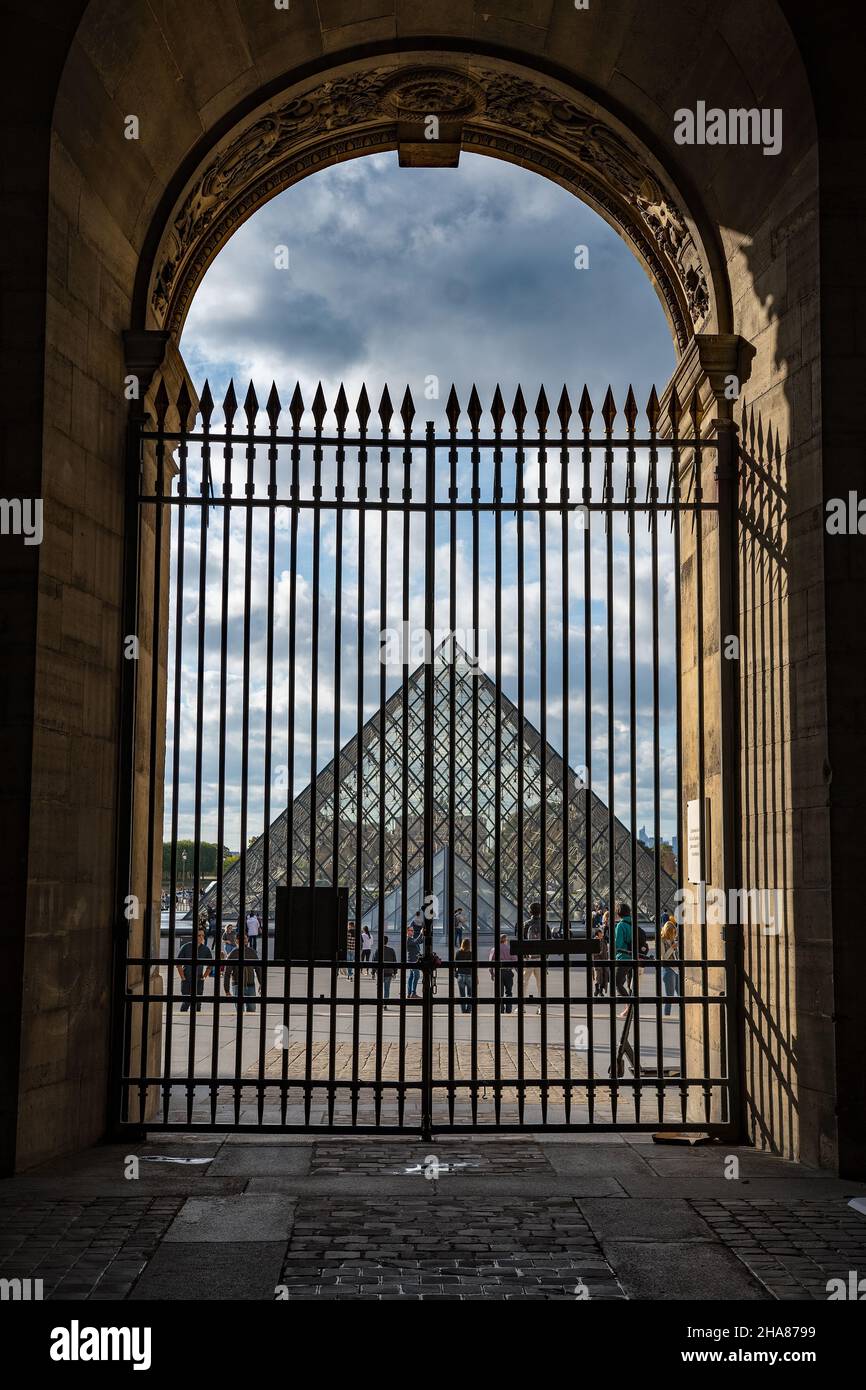 A different perspective to Louvre Pyramid from a lateral corridor Stock ...