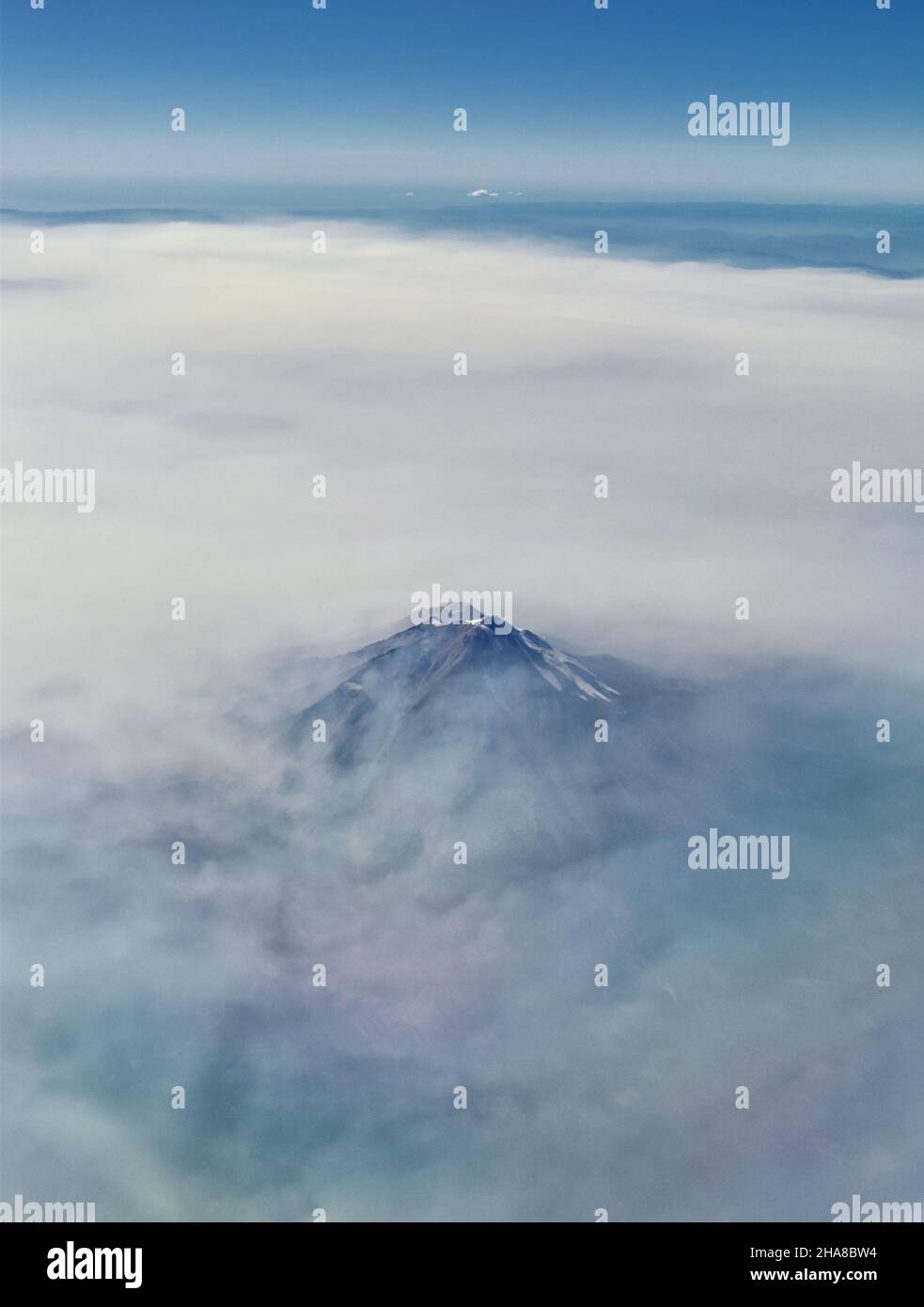 Mount Shasta aerial view from airplane, Northern California Cascade ...