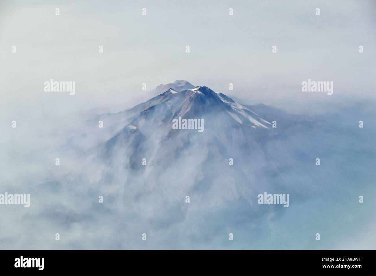 Mount Shasta aerial view from airplane, Northern California Cascade ...