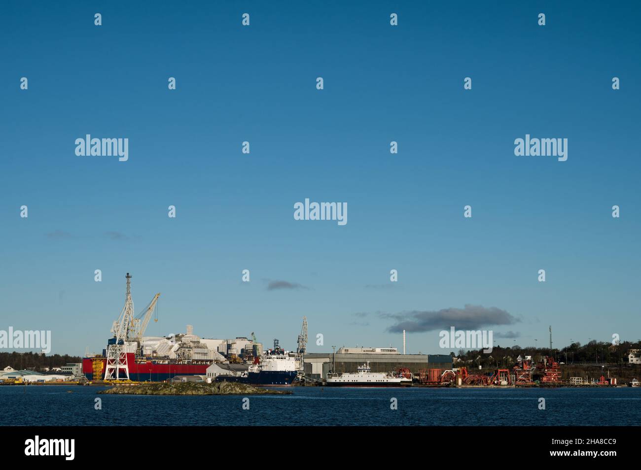 Scenic cityscape of modern norwegian town. Modern cargo port of ...