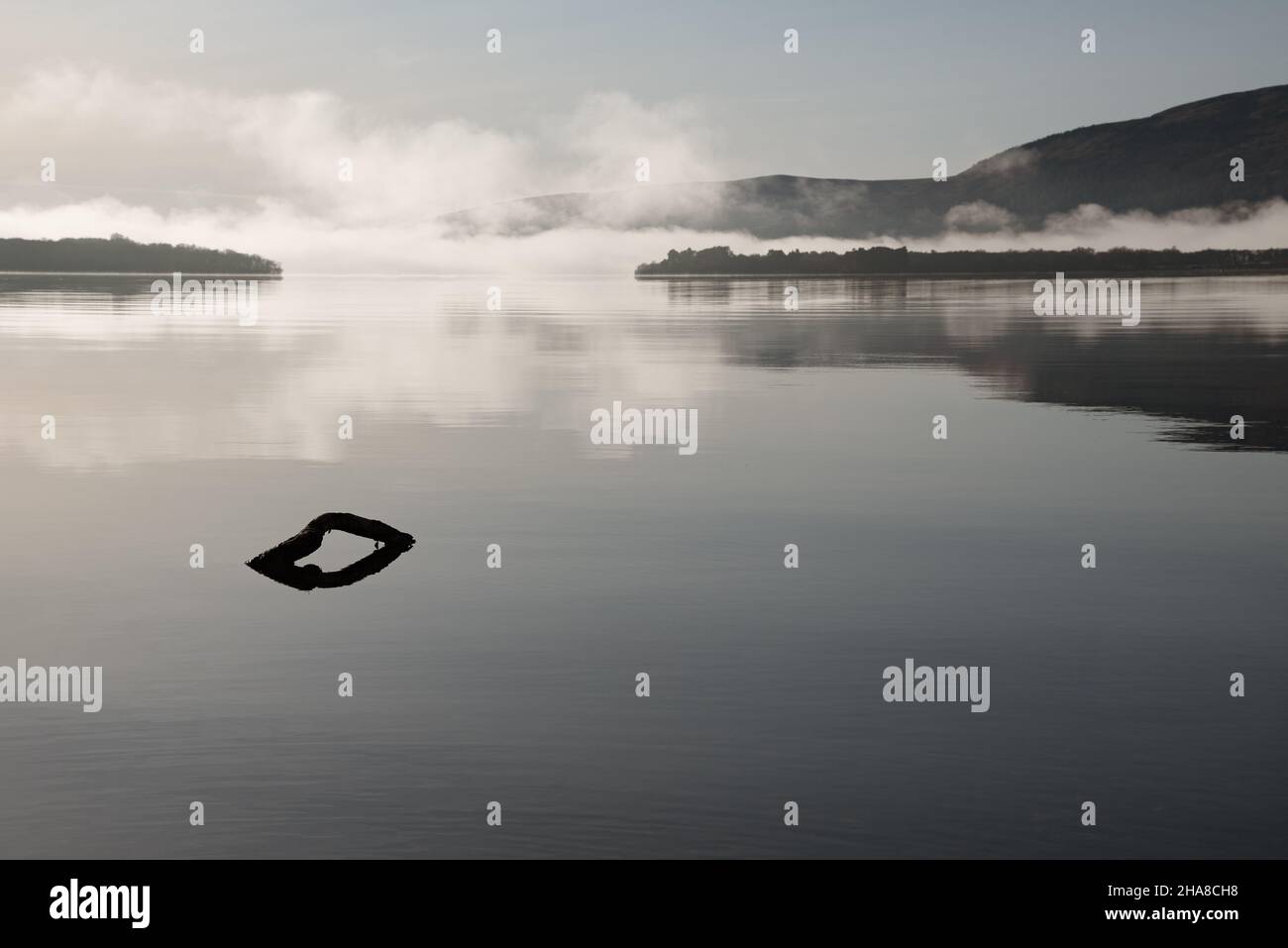 Objects and mist on water Loch Lomond, Scotland Stock Photo - Alamy