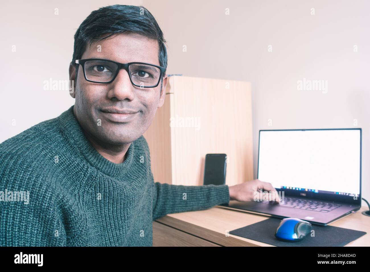 Indian male laptop hi-res stock photography and images - Alamy