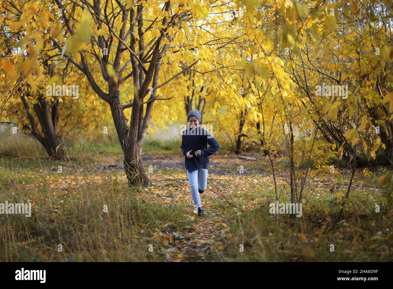 Child runs in forest hi-res stock photography and images - Alamy