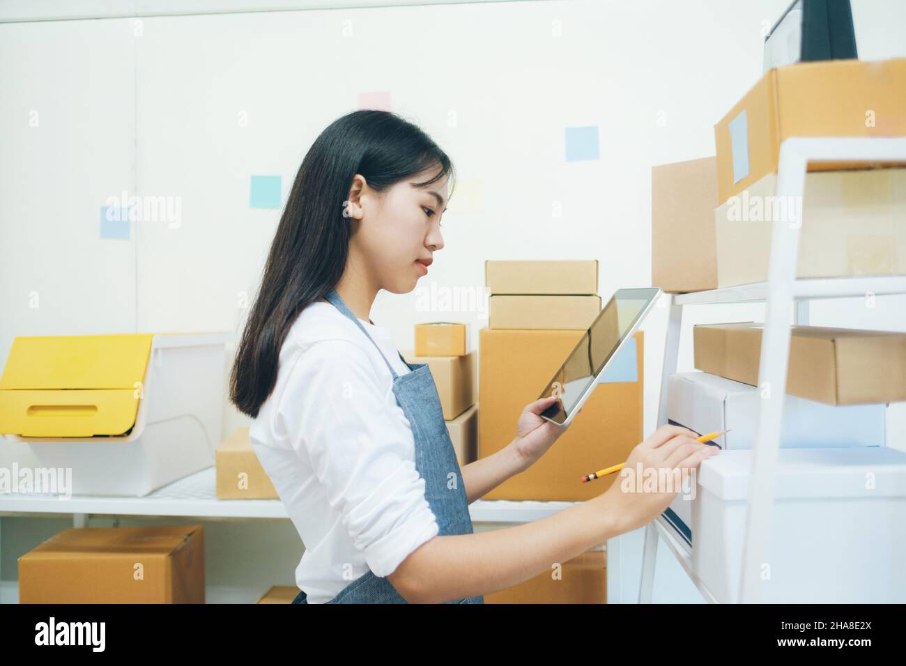 Young business startup online seller owner using computer for checking ...