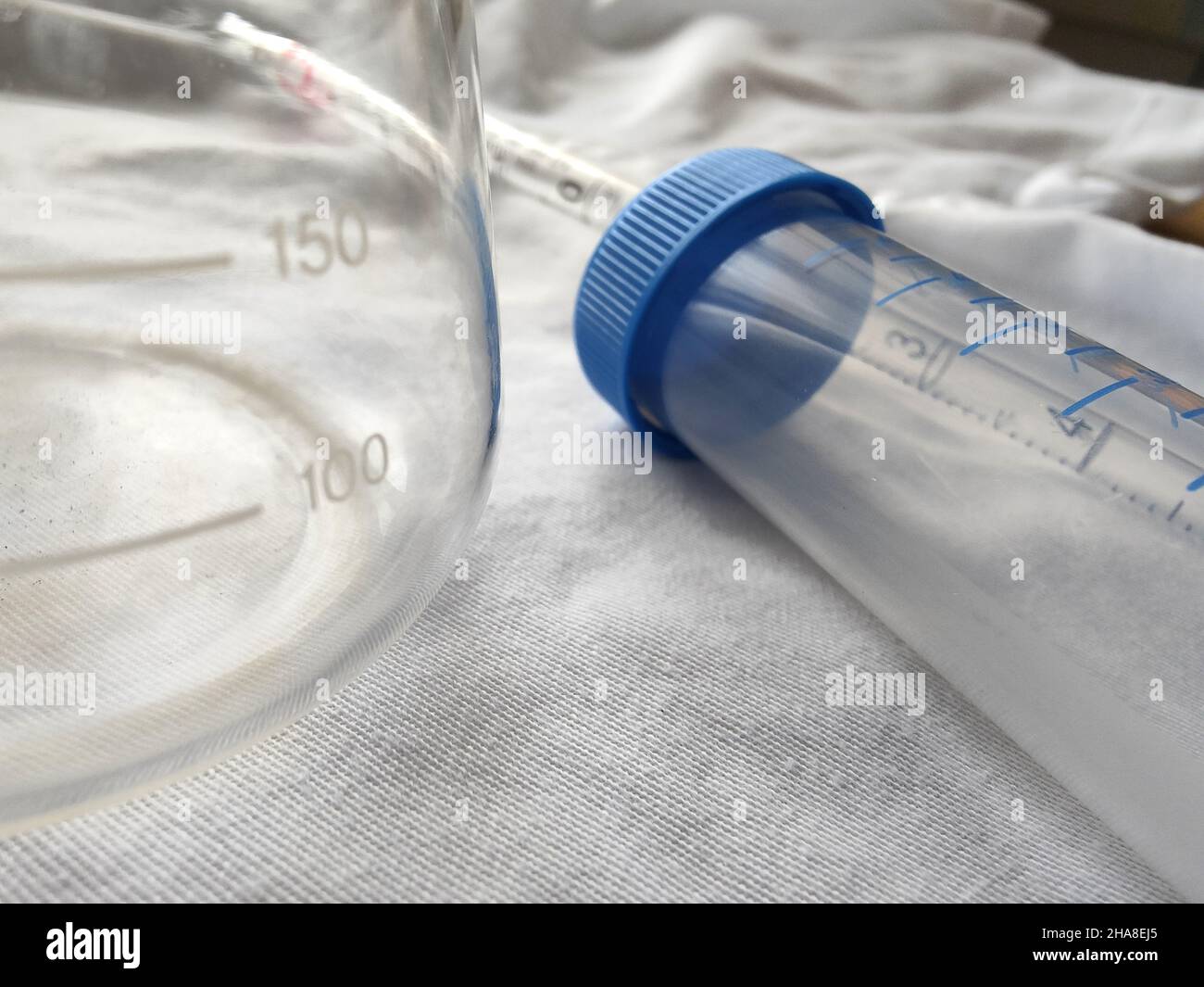 Laboratory flask and sample tube Stock Photo - Alamy