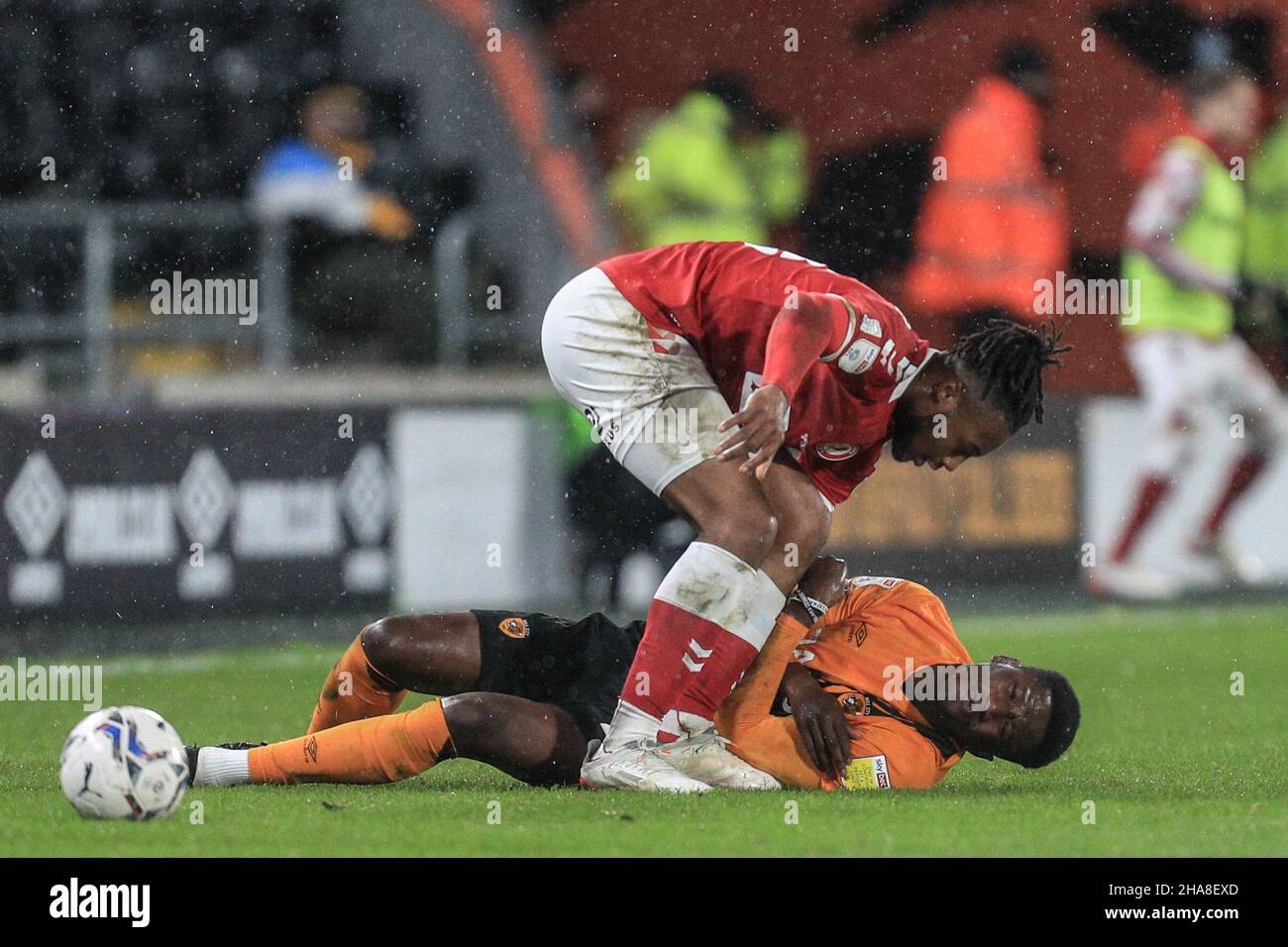 Di'Shon Bernard #24 of Hull City goes down under a strong challenge ...