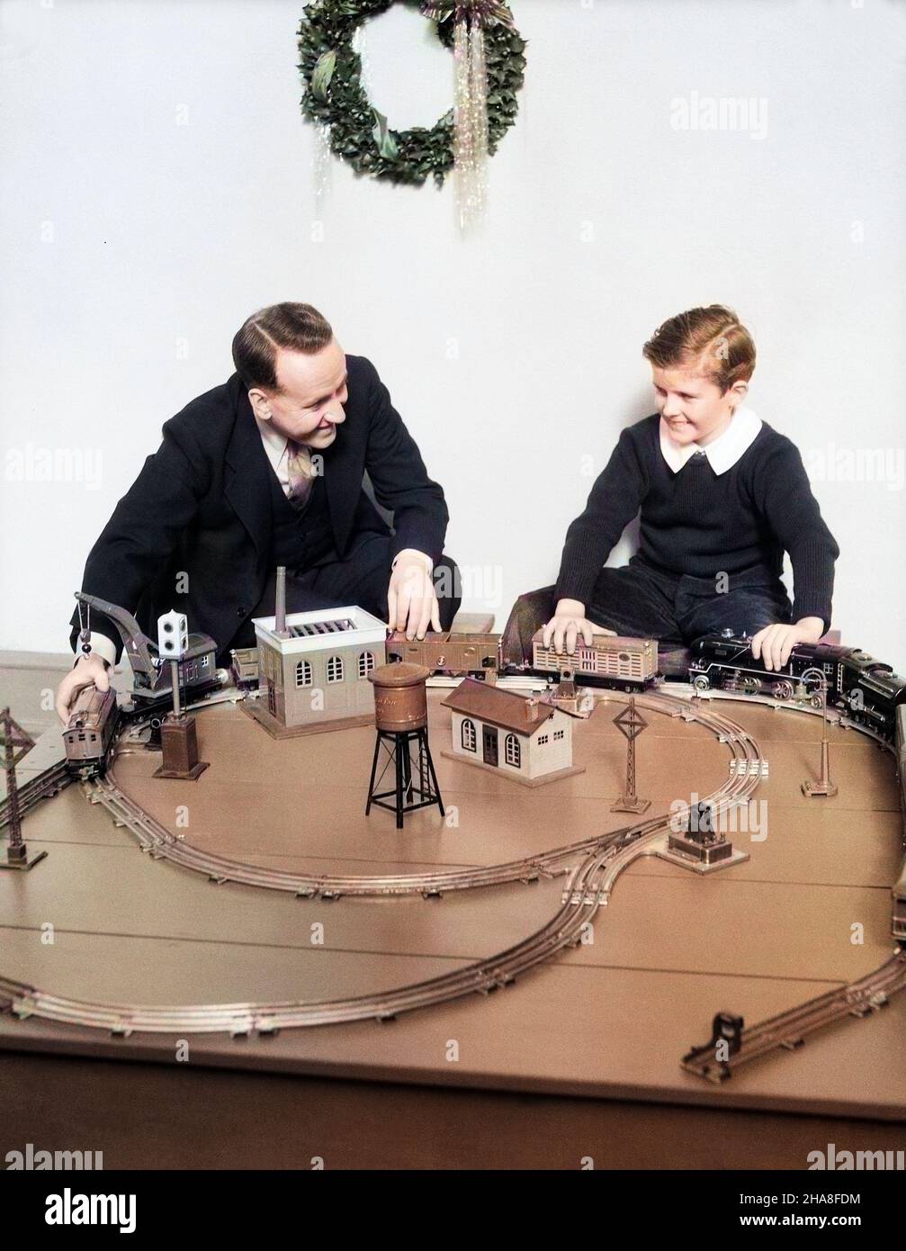 Vintage children playing with train set hi-res stock photography and ...