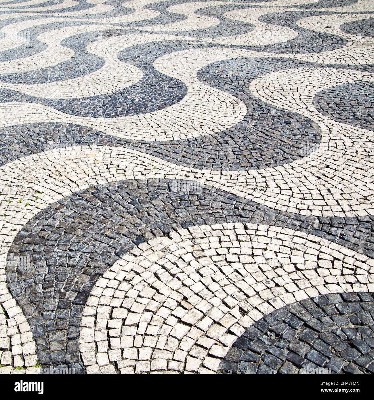 Typical portuguese cobblestone pavement pattern in Lisboa, Portugal ...