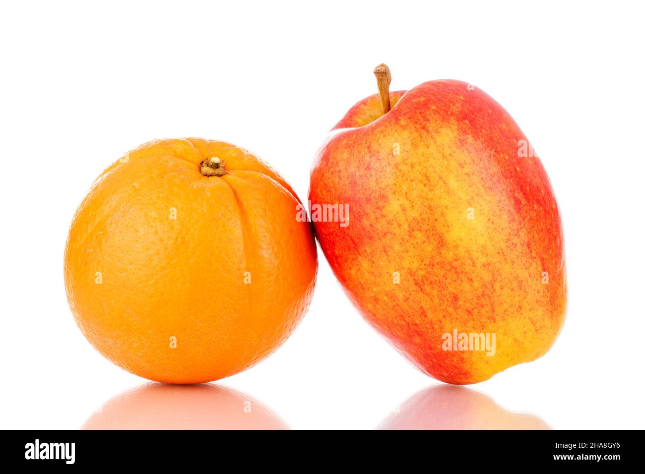 Ripe orange and red apple, close-up, isolated on white Stock Photo - Alamy