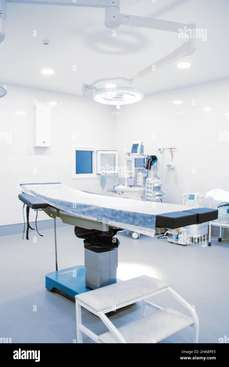 Empty operating room in a hospital. Surgical equipment with operating ...