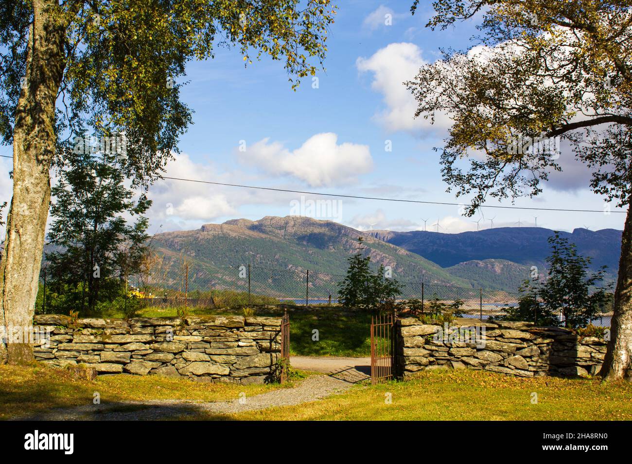Open park gate, with mountains and sea on the background Stock Photo ...