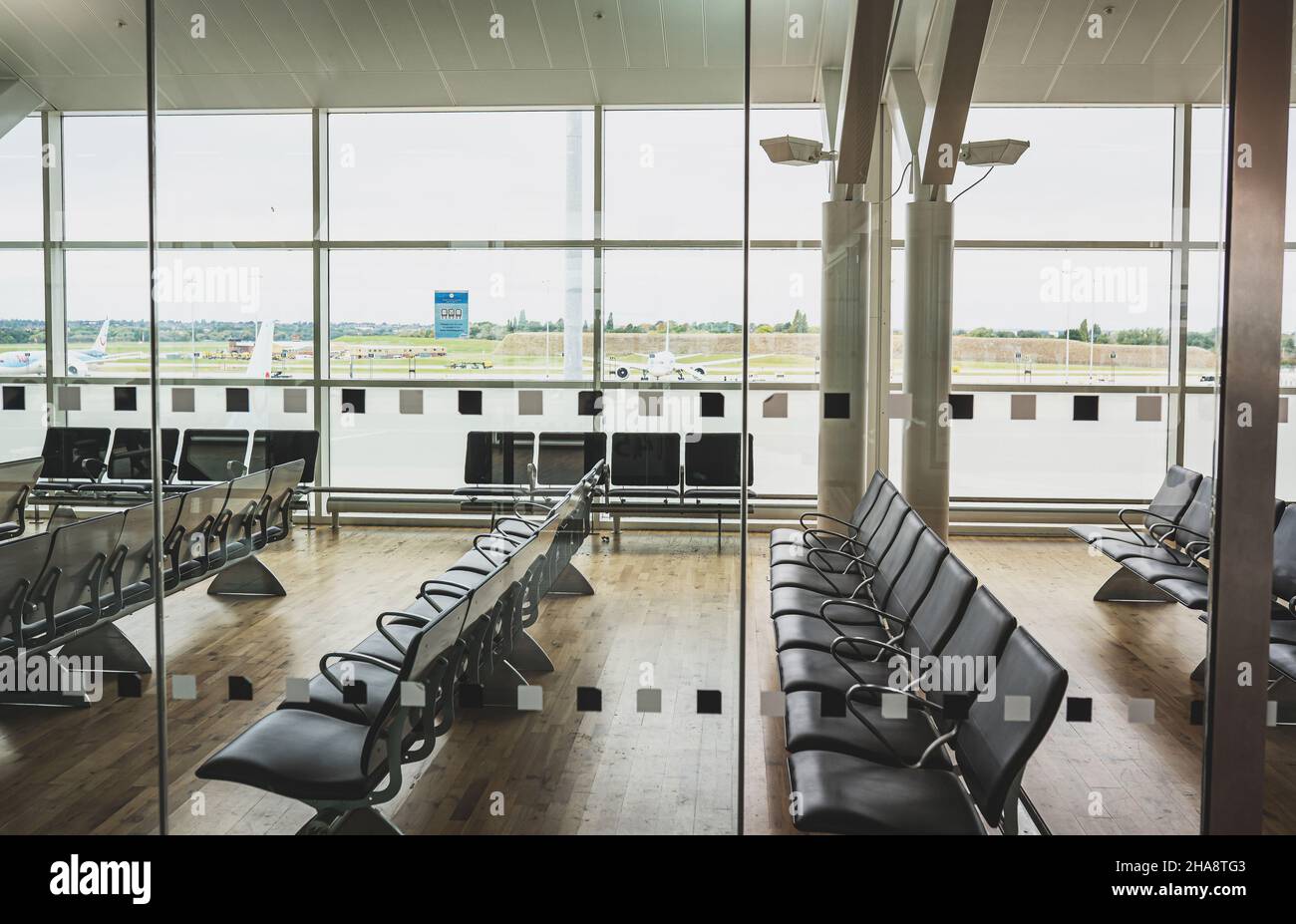 Empty airport terminal waiting area seats in the Birmingham ...