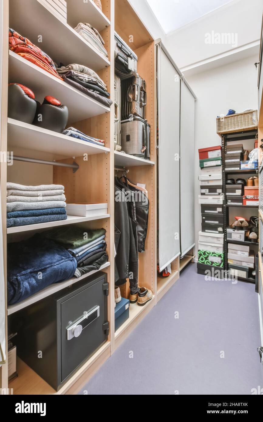 Large spacious dressing room in elegant apartment Stock Photo - Alamy